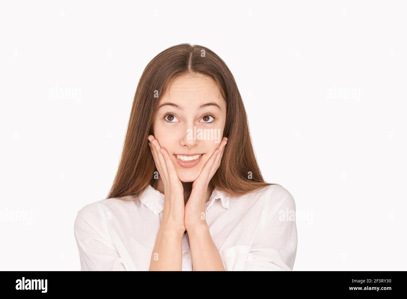 Happy smile emotion. Surprise gesture. Attractive teenager. Hands near ...