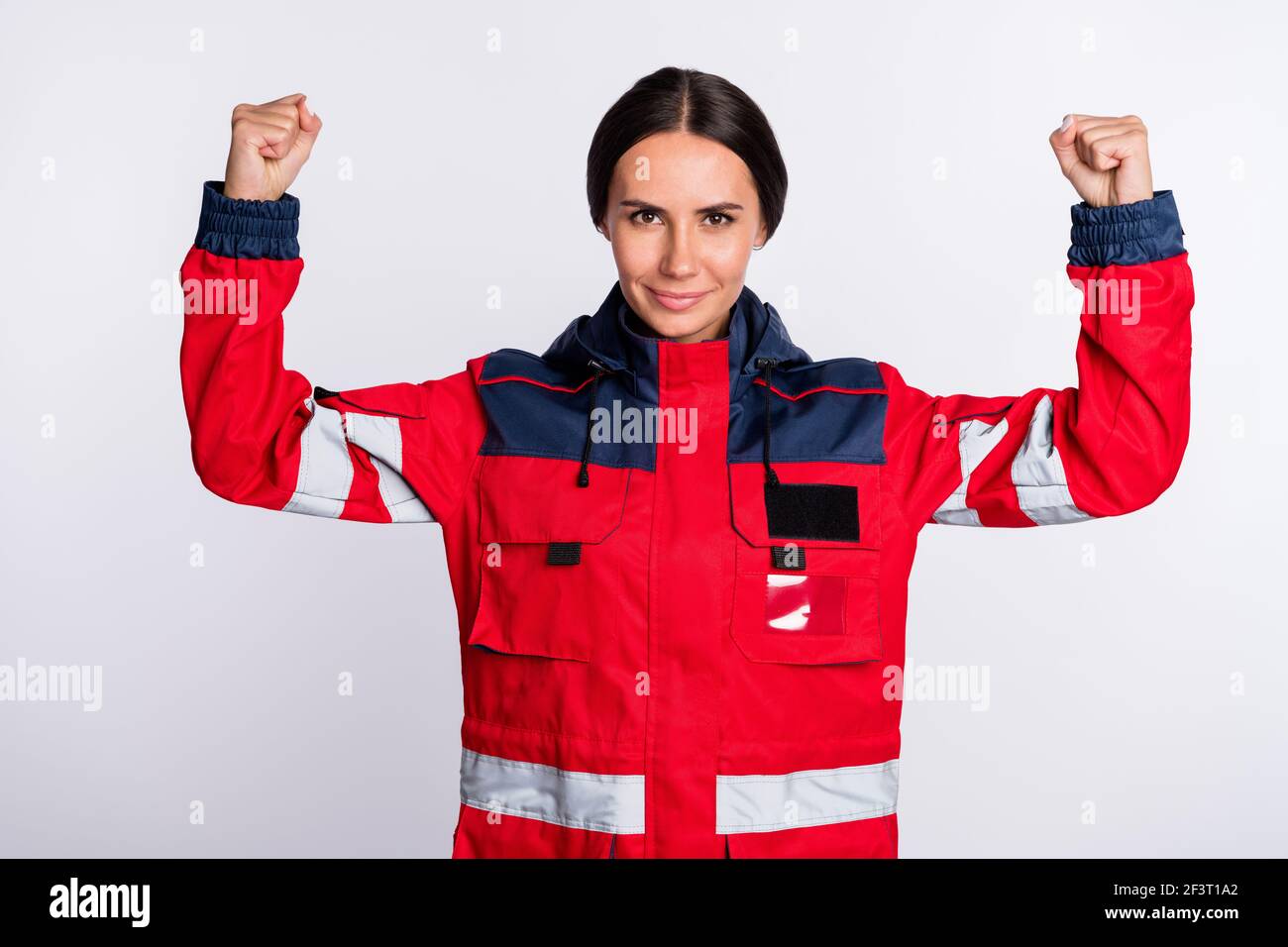 Photo of young woman paramedic first aid medicine help show hand power ...