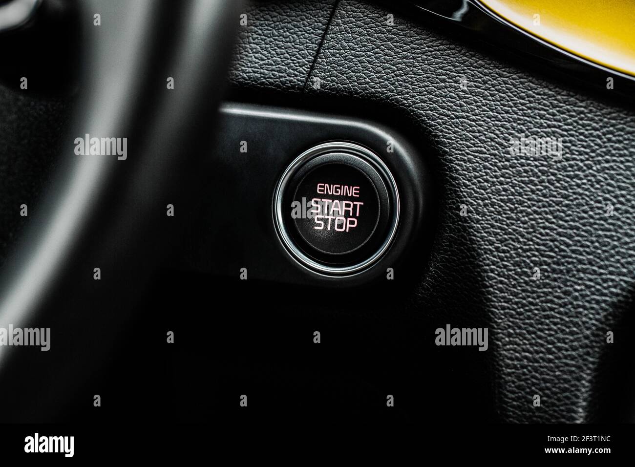 Close up engine car start stop button. Modern car black interior ...