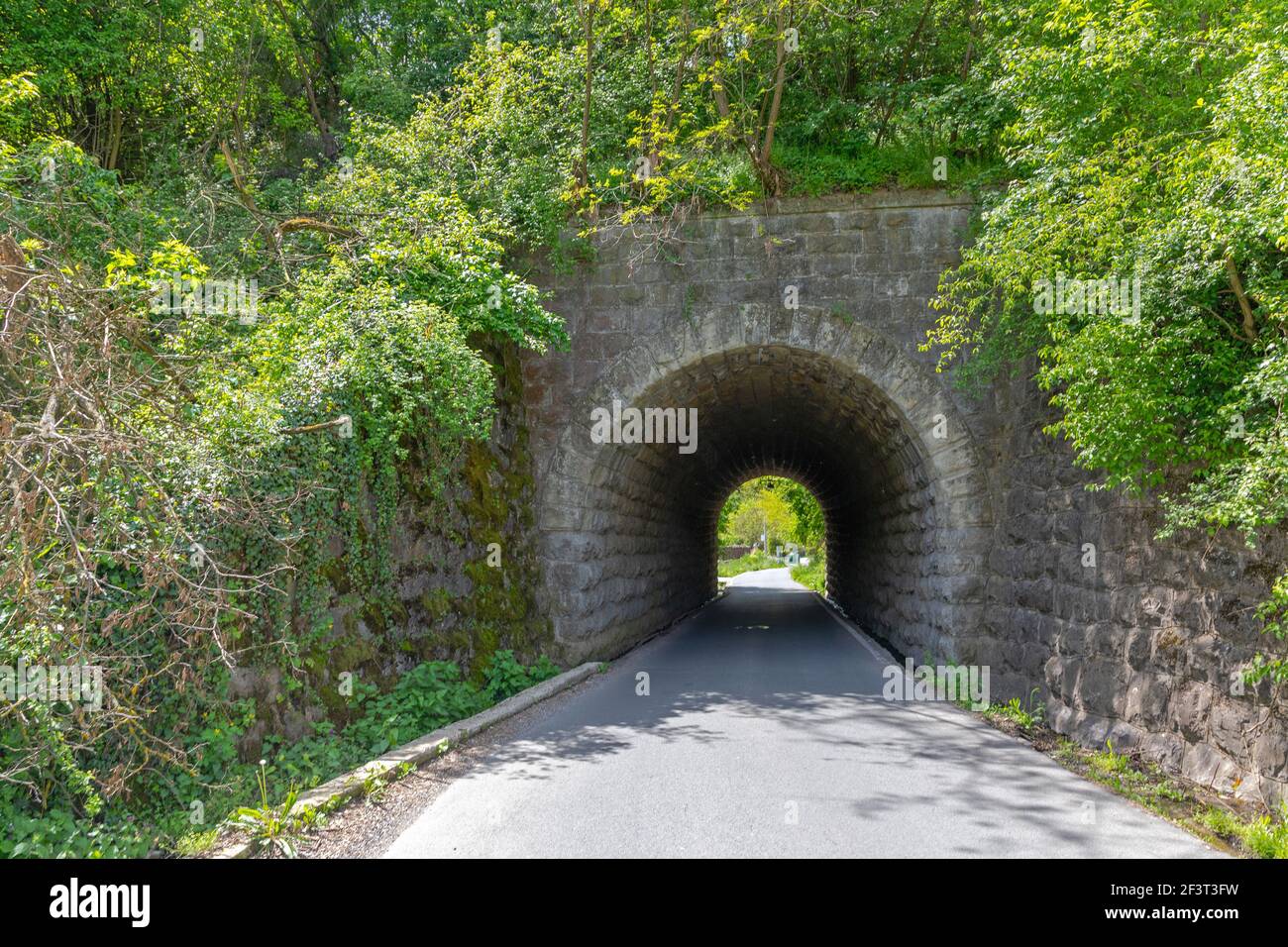 Short and Narrow Road Tunnel Passageway Stone Arch Stock Photo - Alamy