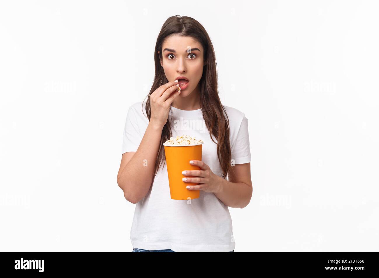 Entertainment, fun and holidays concept. Portrait of woman entertained ...