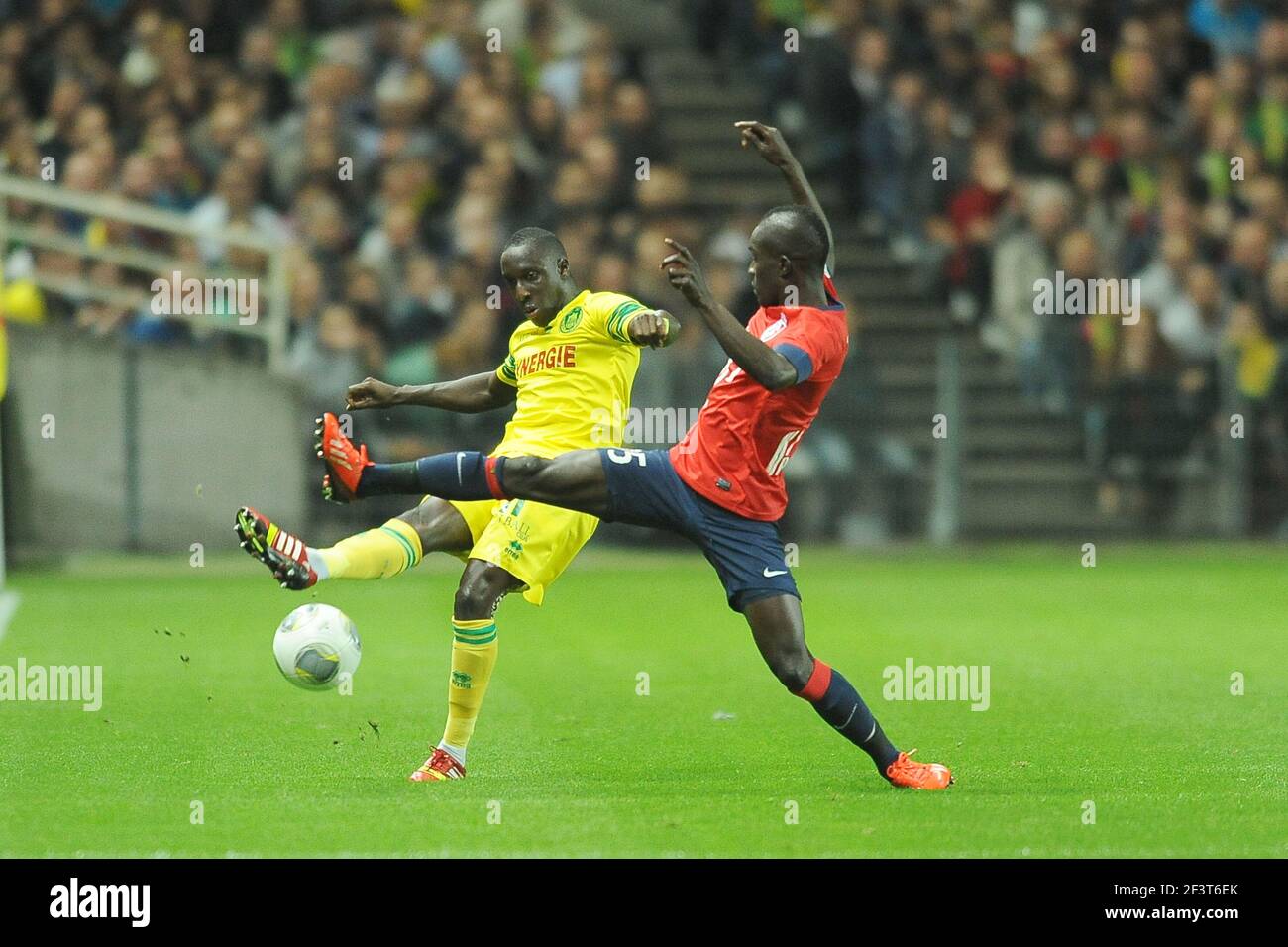 Issa CISSOKHO of Nantes vies with Lille's Idrissa GUEYE during the ...