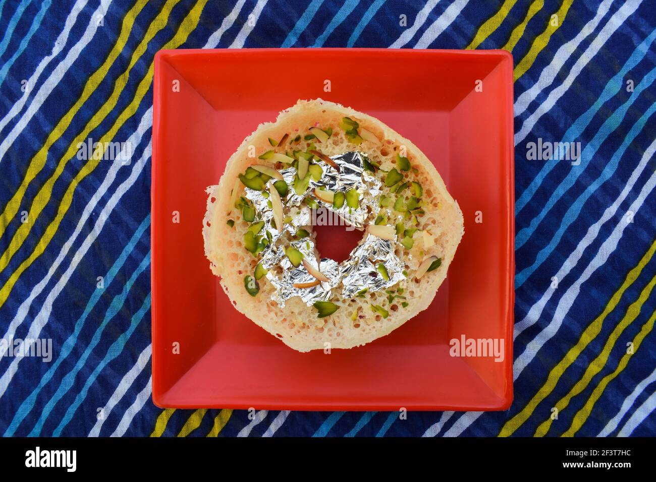 Traditional Indian sweet dish Ghevar or Ghewar from India Stock Photo ...