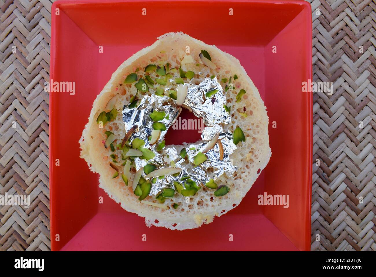 Traditional and authentic halwai style Indian sweet dish called Ghevar ...