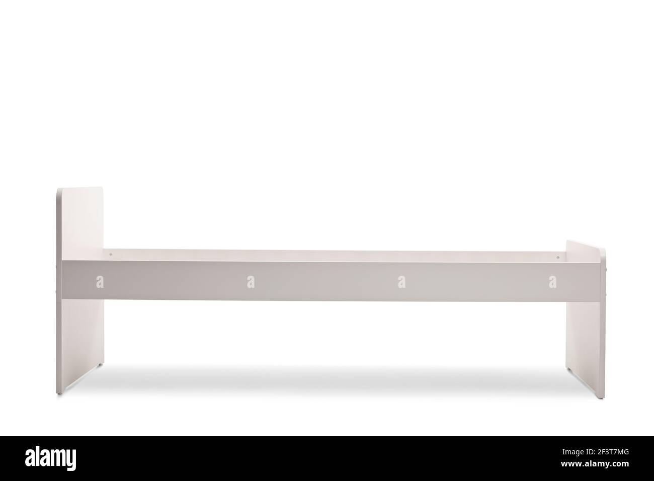Studio shot of a white single empty bed without mattress isolated on ...