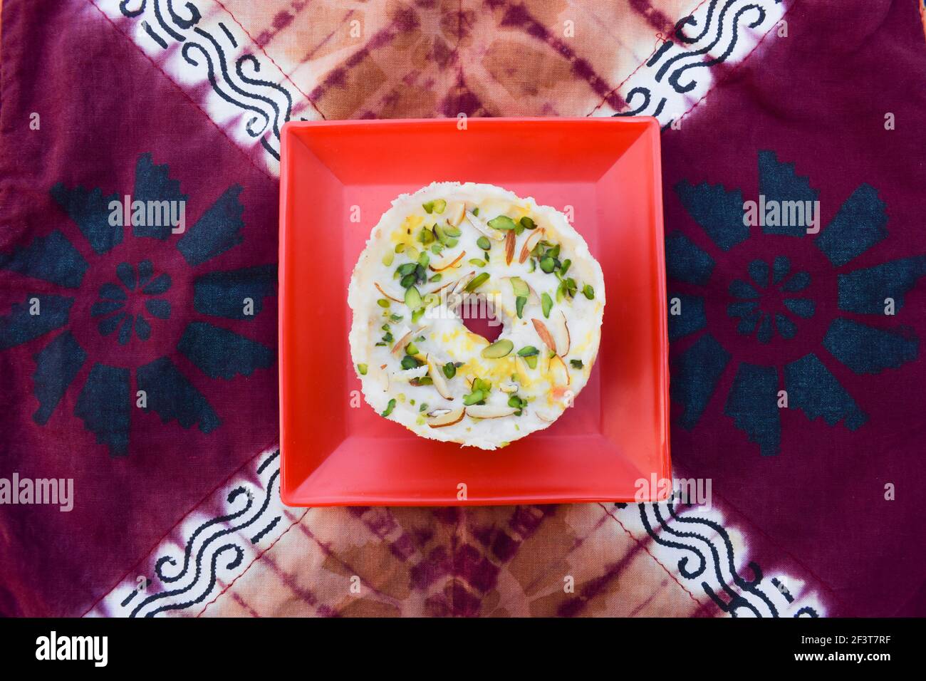 Traditional Indian festival dessert sweet Ghevar. unique different from ...