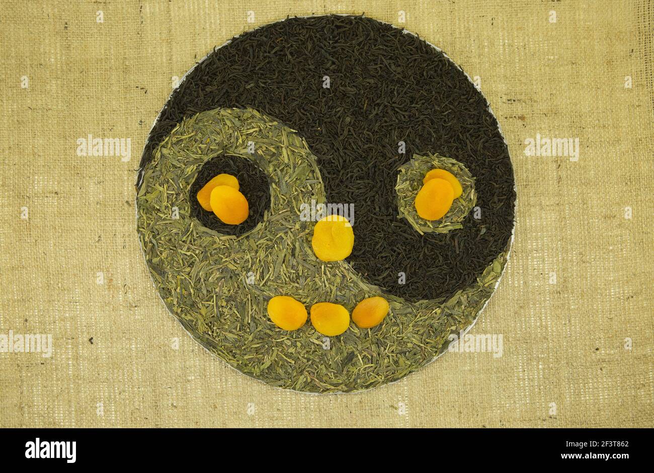 The concept of yin yang. Sign yin yang against the background of burlap ...
