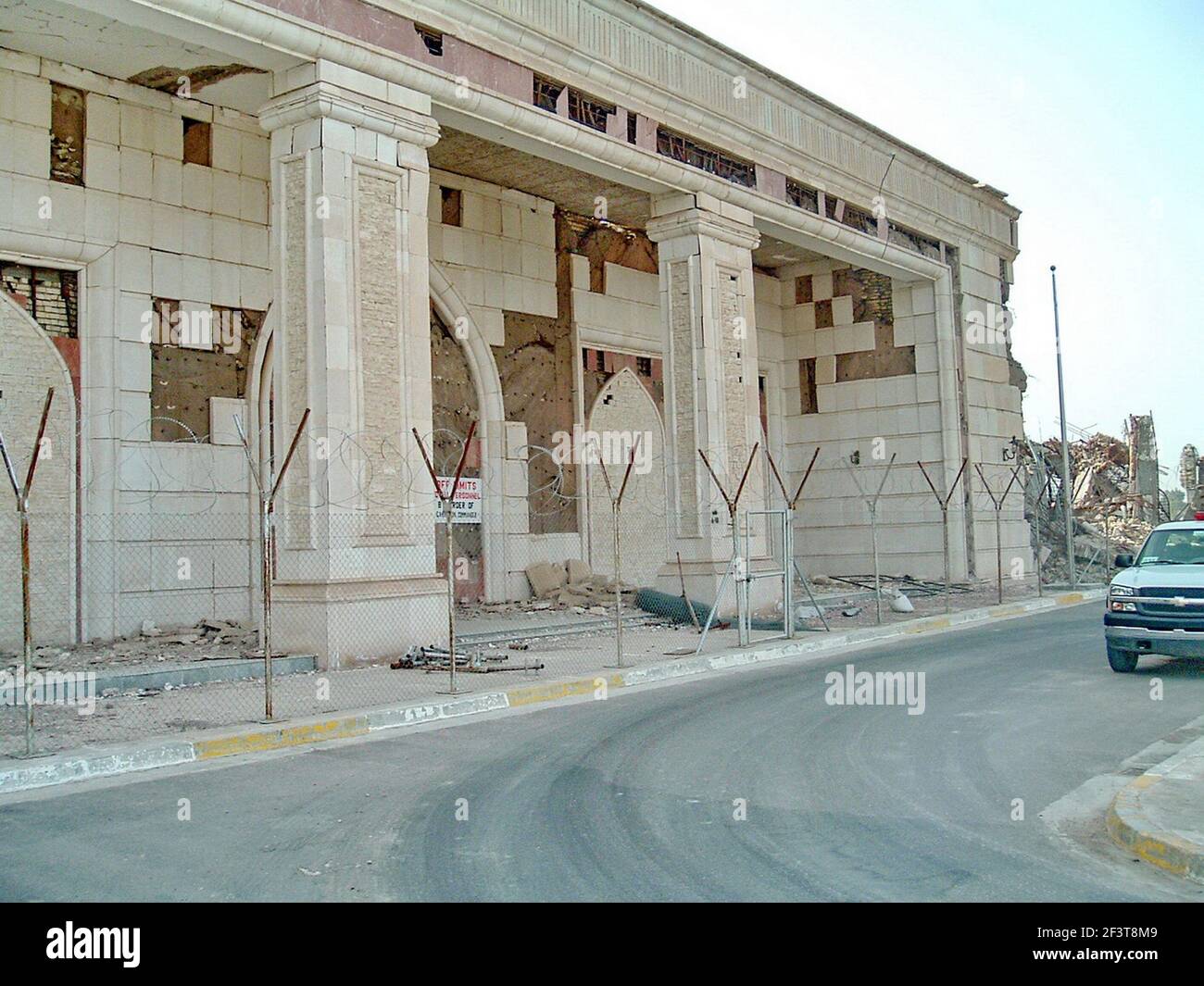 Fire department truck parked in front of a damaged building on Camp ...