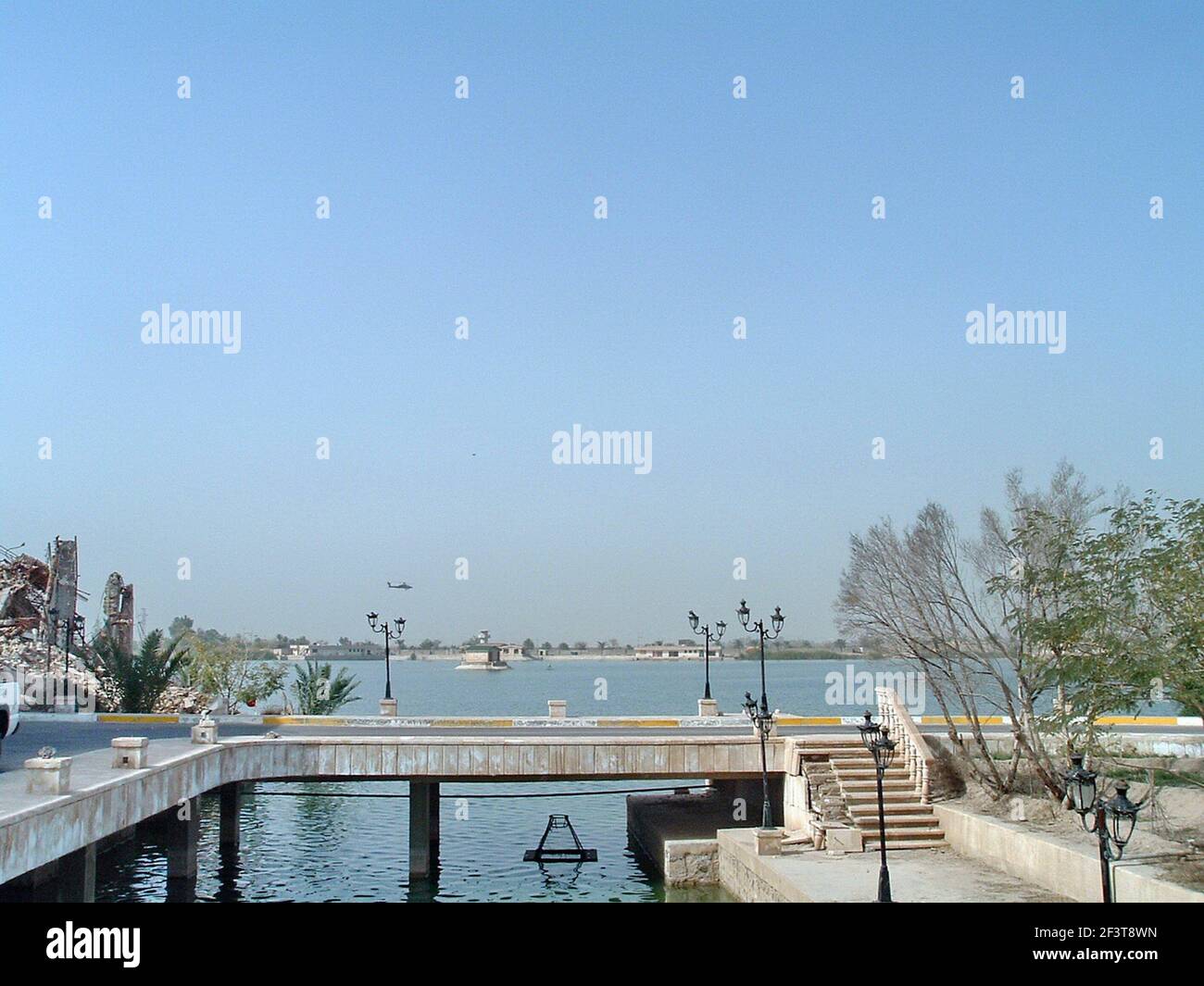 Driveway over a lake to a Sadaam era building on Camp Slayer, in ...