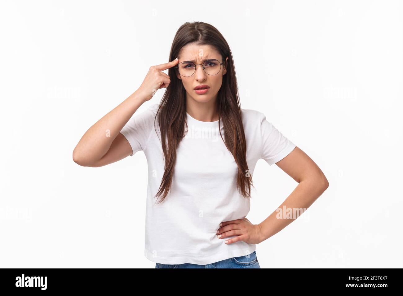 Are you dumb. Portrait of skeptical and bothered, annoyed young woman ...