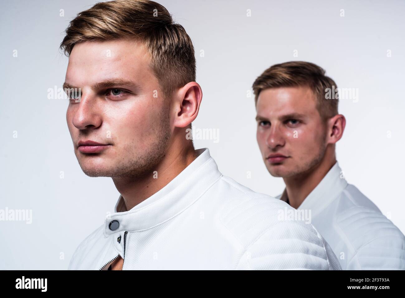 young twin brothers with similar appearance, twins Stock Photo - Alamy