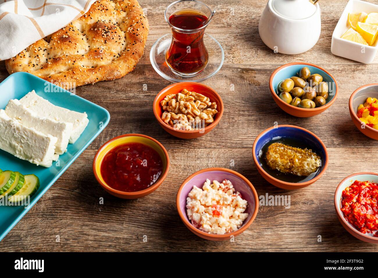 Healthy Turkish breakfast, with sliced tomato, cucumber, and white feta ...