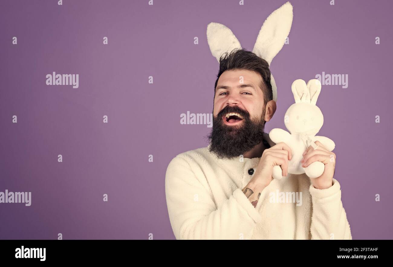 Cuddly bunny. Symbolizing spring, new life and fertility. Bearded man ...