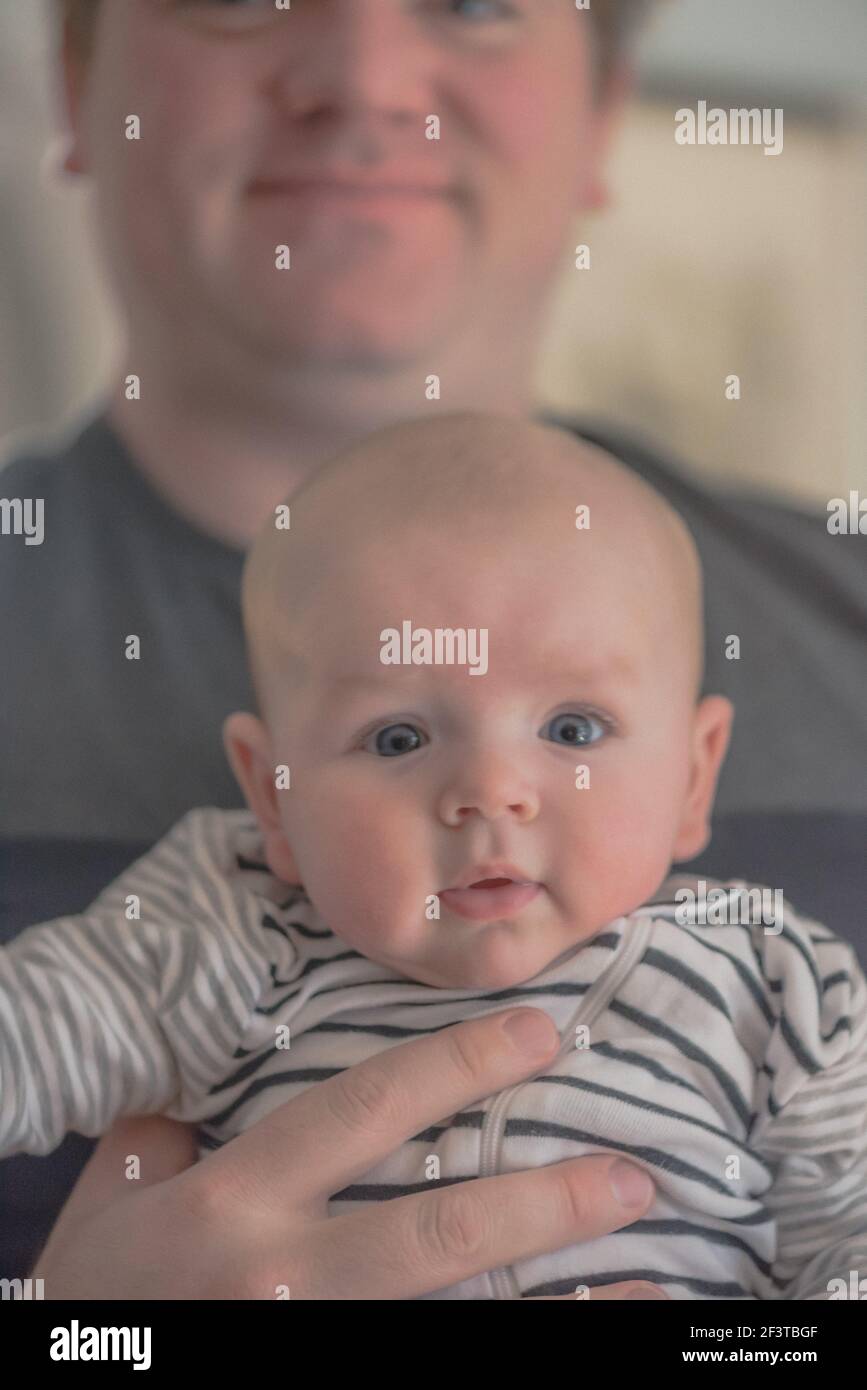 Baby with her father Stock Photo - Alamy