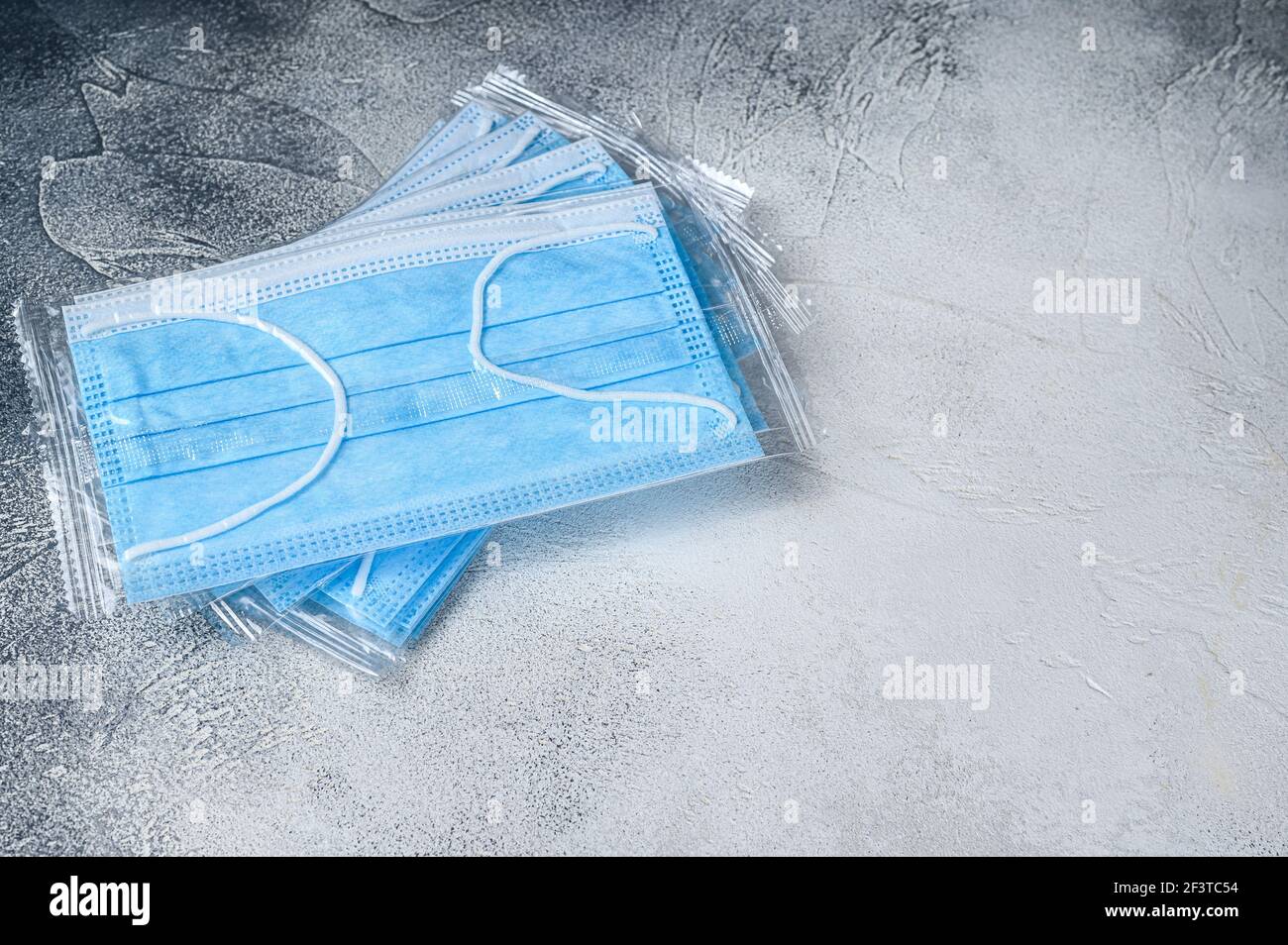 Blue ear loop surgical face masks. Disposable procedural face mask with ...