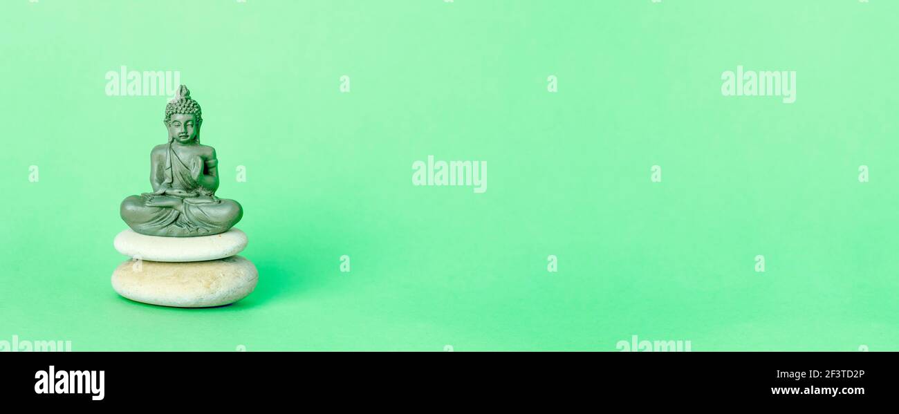 Zen banner background green color with Japanese stone towers for spa ...