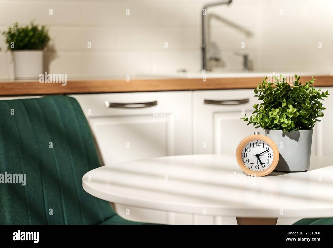 The clock shows five in the morning Stock Photo - Alamy