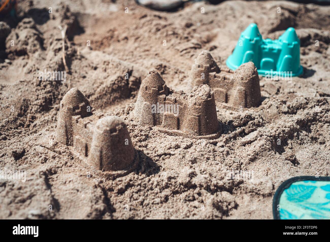 A closeup shot of sandcastles on a beach Stock Photo - Alamy