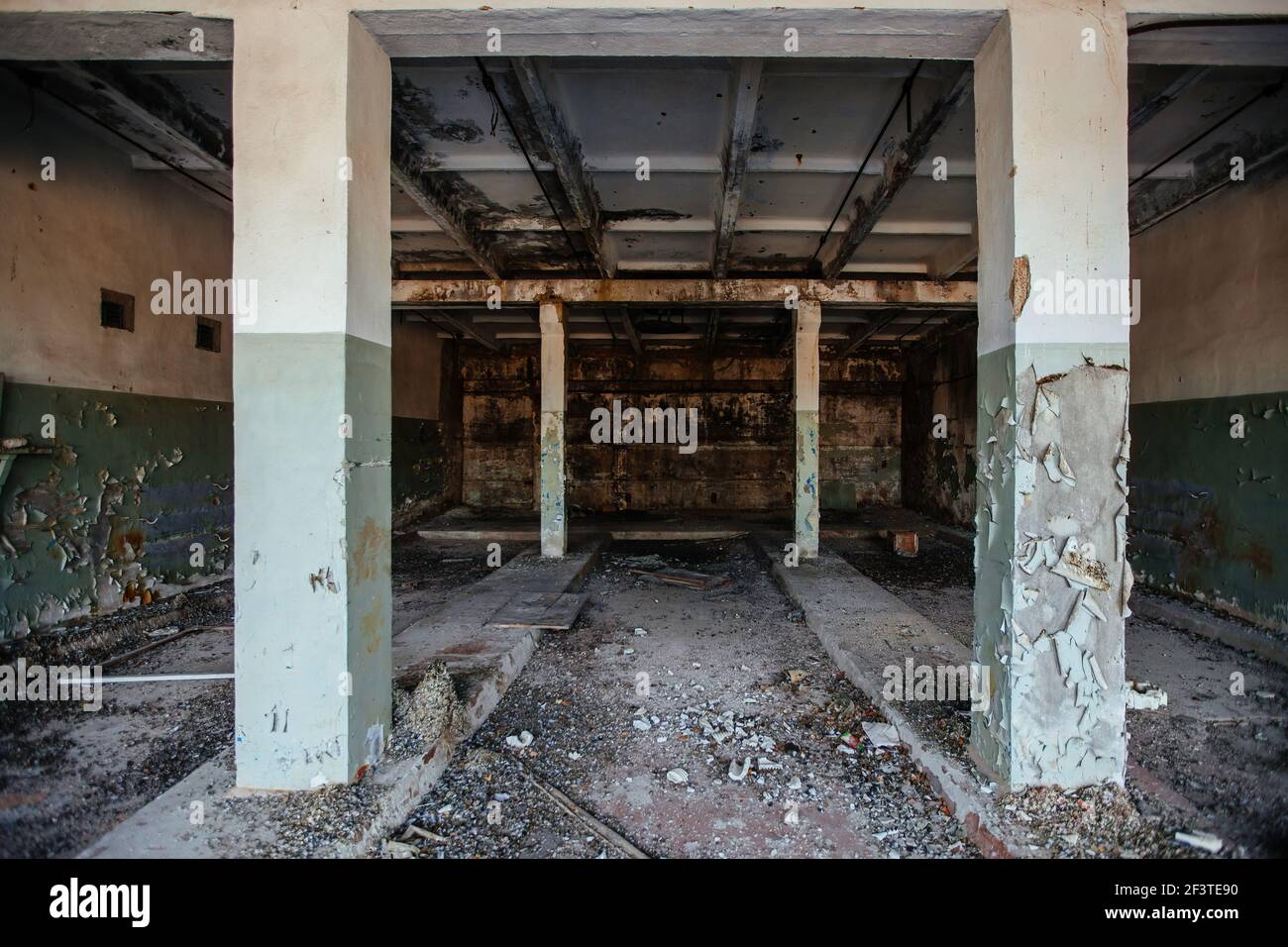 Old broken empty abandoned industrial building interior Stock Photo - Alamy