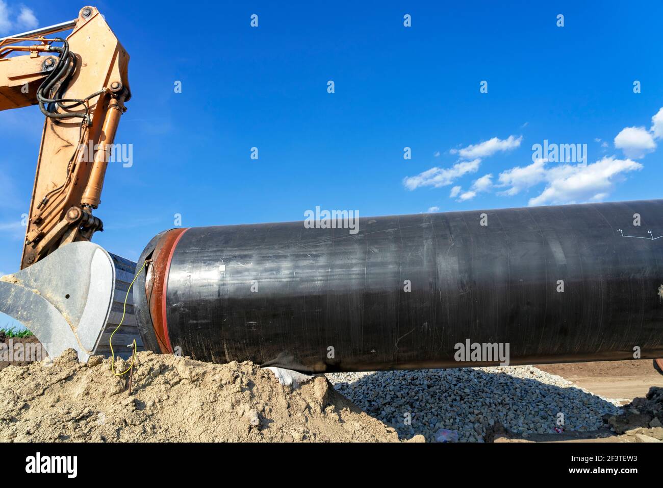 Heavy Machinery and Gas Pipeline Construction Site. Pipes are Laid on ...
