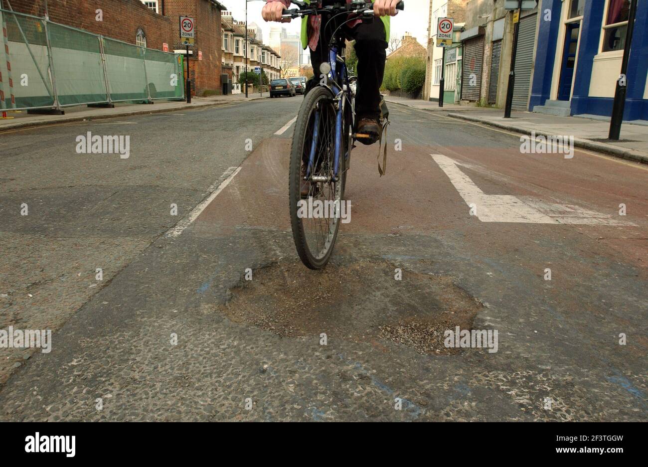 Bikes and Potholes 2/2/07 Tom Pilston Stock Photo - Alamy