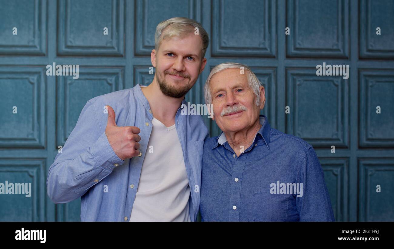 Happy different male generations family of senior father and adult son ...