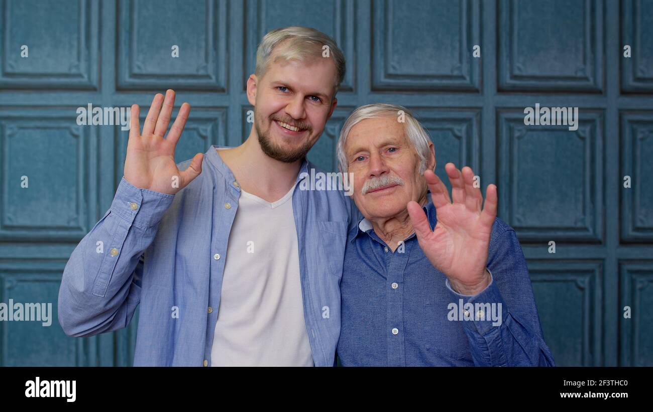 Happy different male generations family of senior father and adult son ...