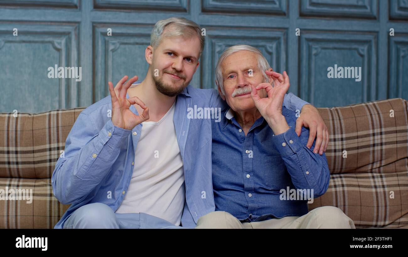 Different male generations family of senior father and adult son or ...