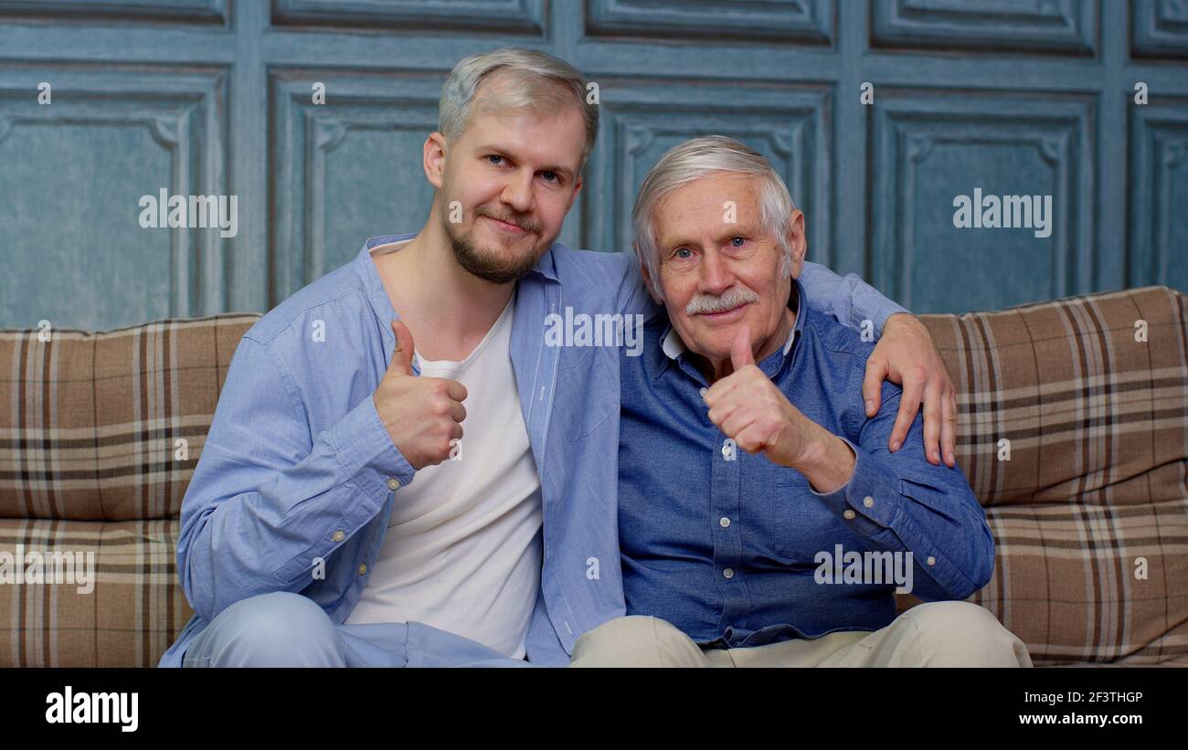 Happy different male generations family of senior father and adult son ...