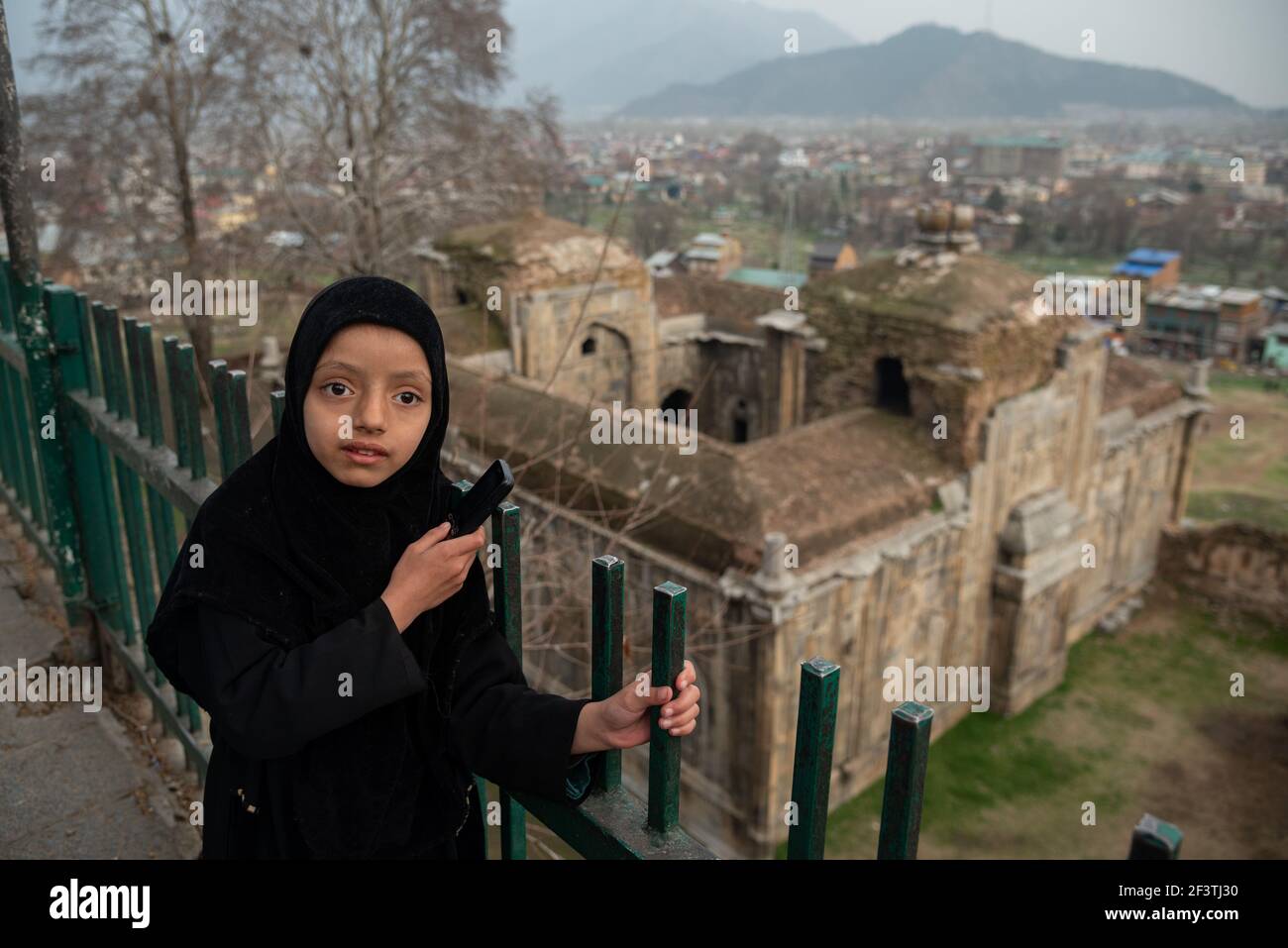 Srinagar, Jammu and Kashmir, India. 15th Mar, 2021. A Kashmiri girl ...