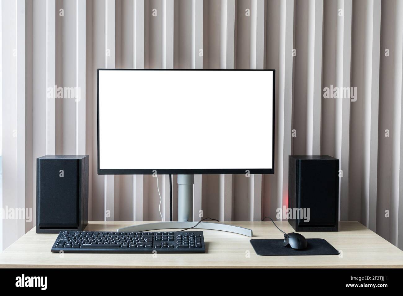 Workspace blank screen Computer and Equipment on table and wall ...