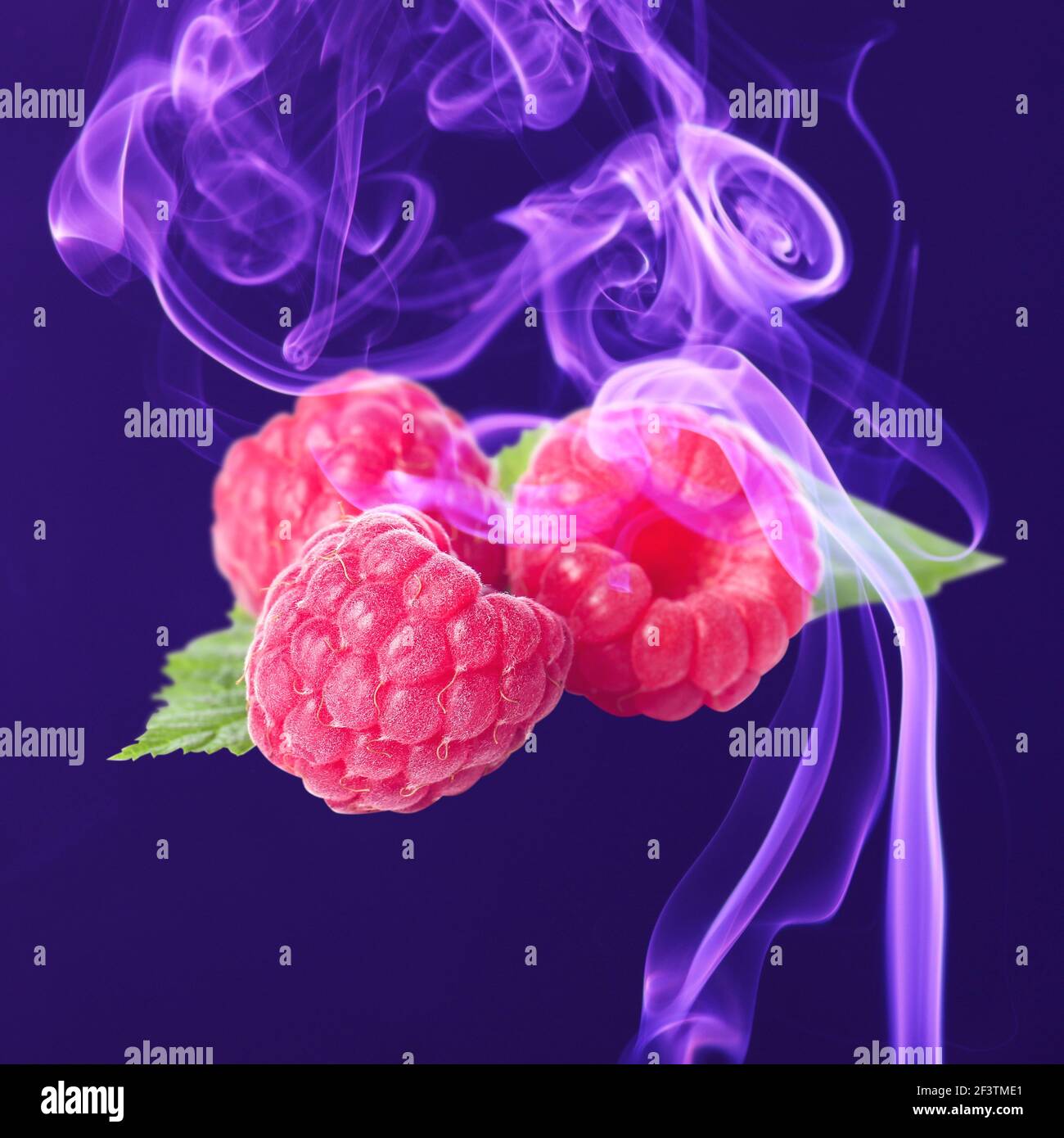 Tasty ripe raspberries and color smoke on dark background Stock Photo ...