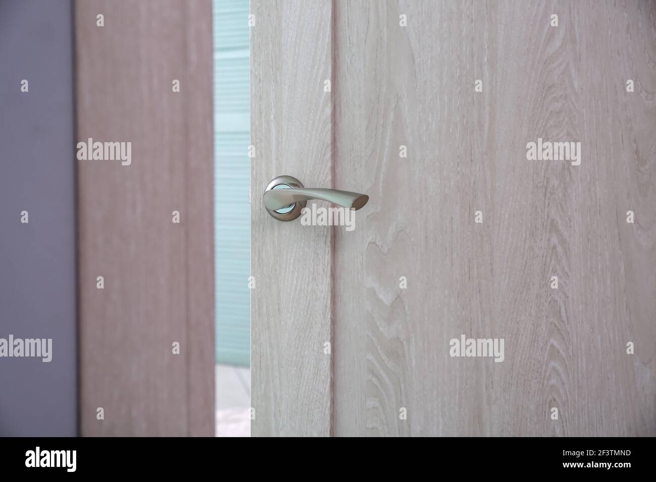 View of living room through open door Stock Photo - Alamy