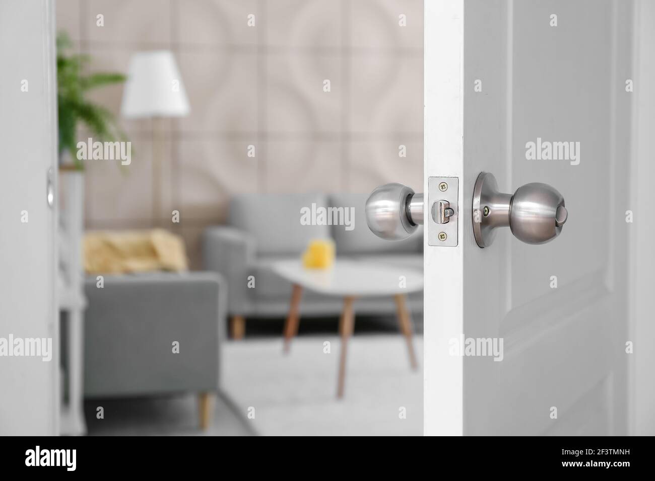 View of room through open door Stock Photo - Alamy