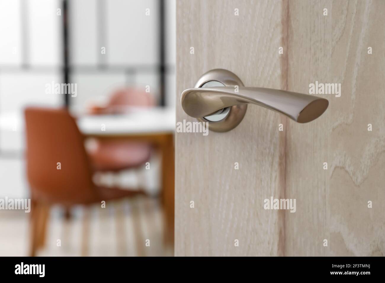 View of living room through open door Stock Photo - Alamy