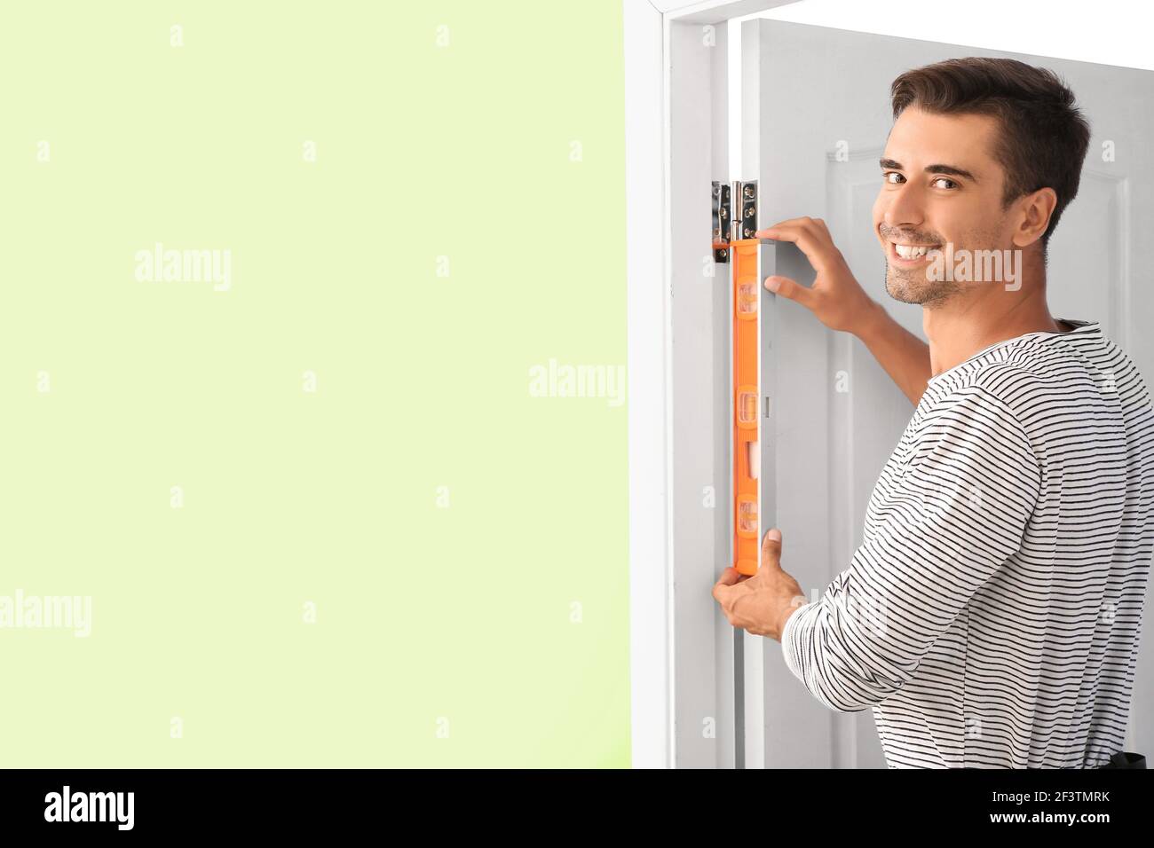 Young man taking measurements hi-res stock photography and images - Alamy