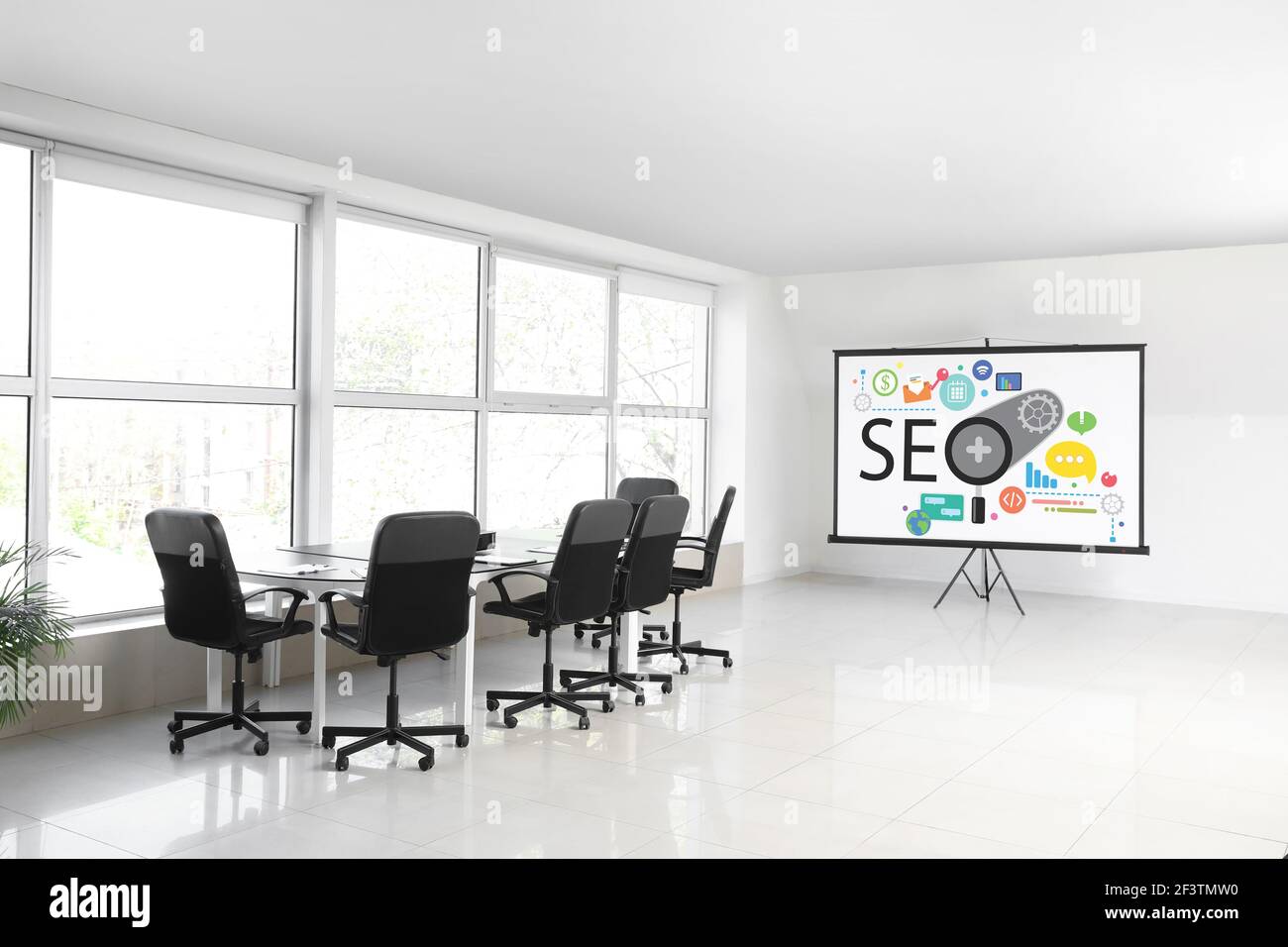 Interior of stylish modern office with modern projector screen. Concept ...