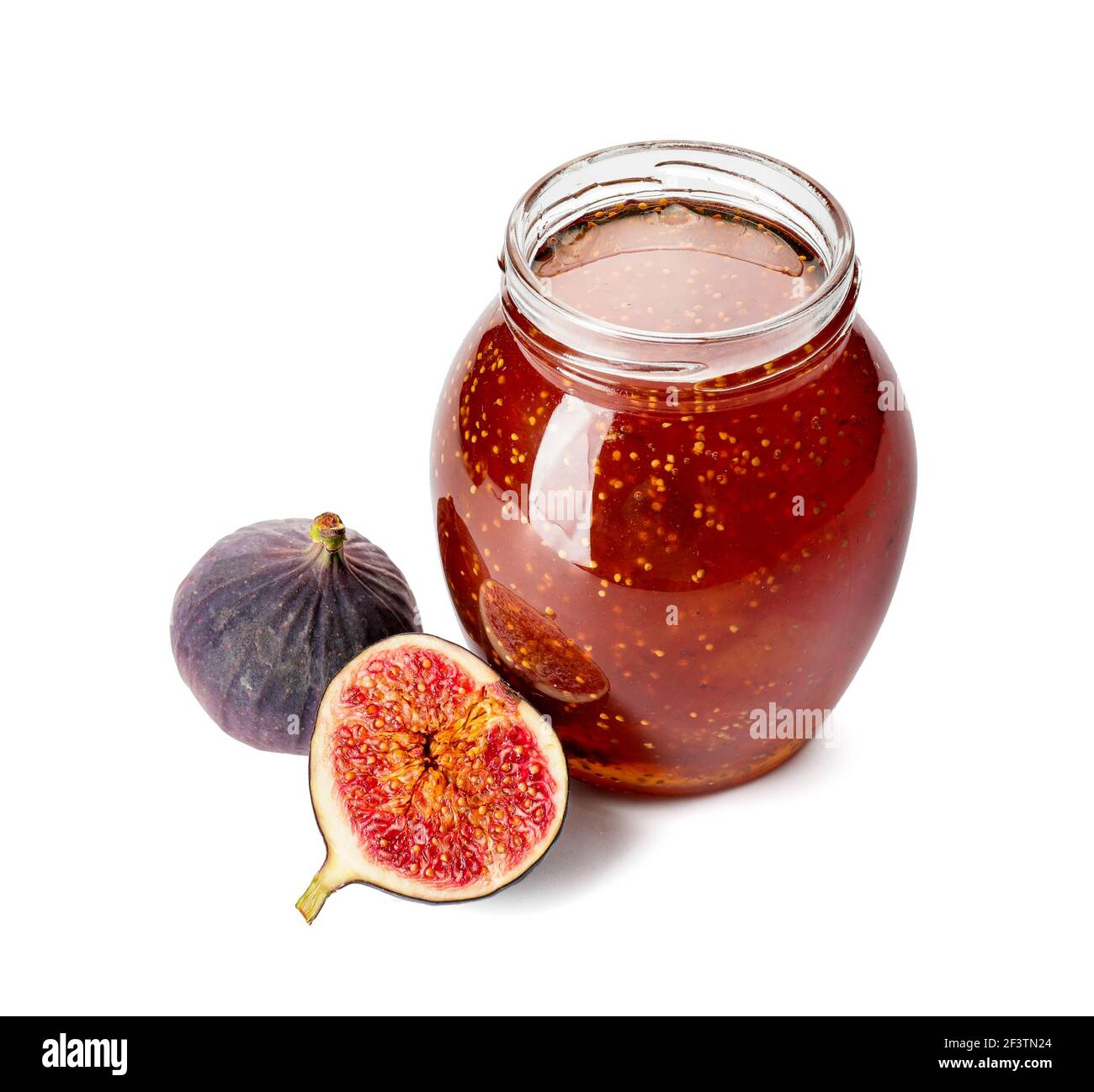 Jar of sweet fig jam on white background Stock Photo - Alamy