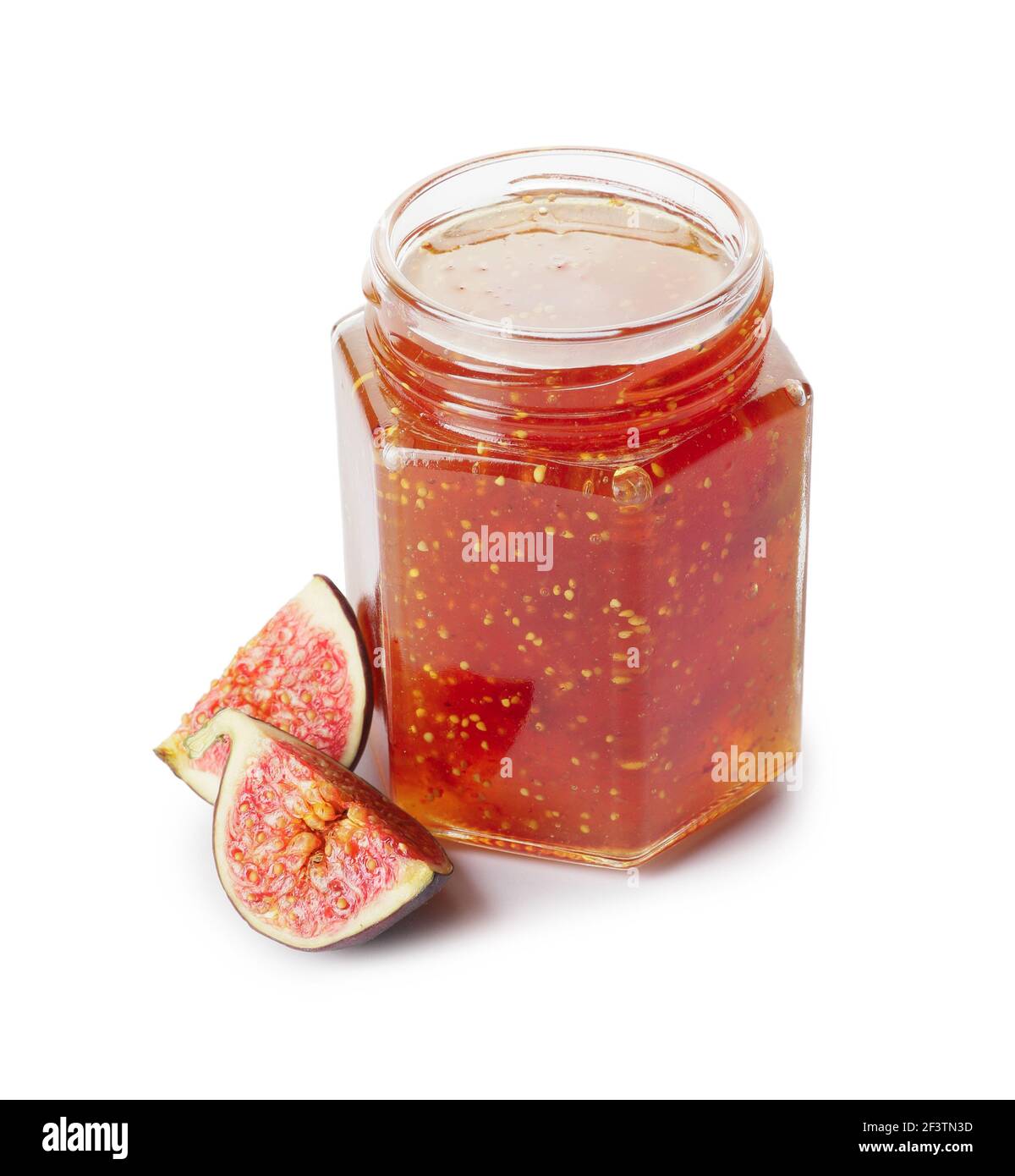 Jar of sweet fig jam on white background Stock Photo - Alamy