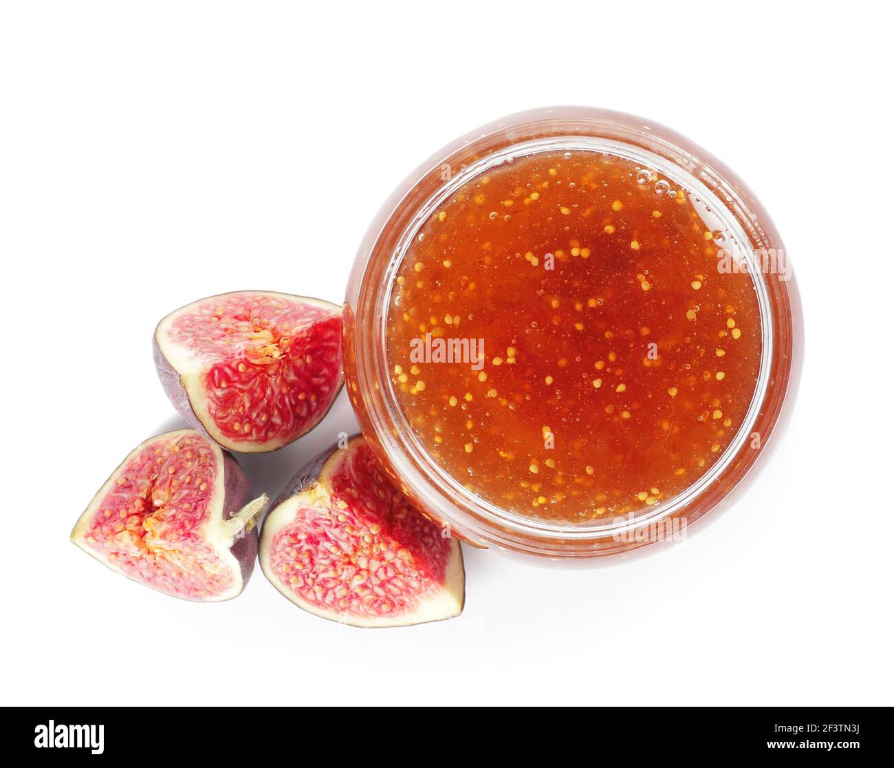 Jar of sweet fig jam on white background Stock Photo - Alamy