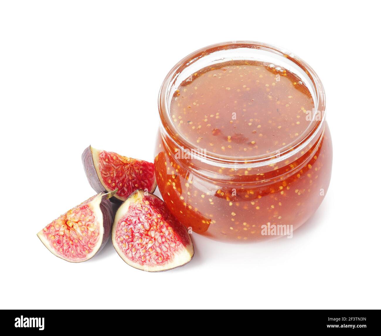 Jar of sweet fig jam on white background Stock Photo - Alamy
