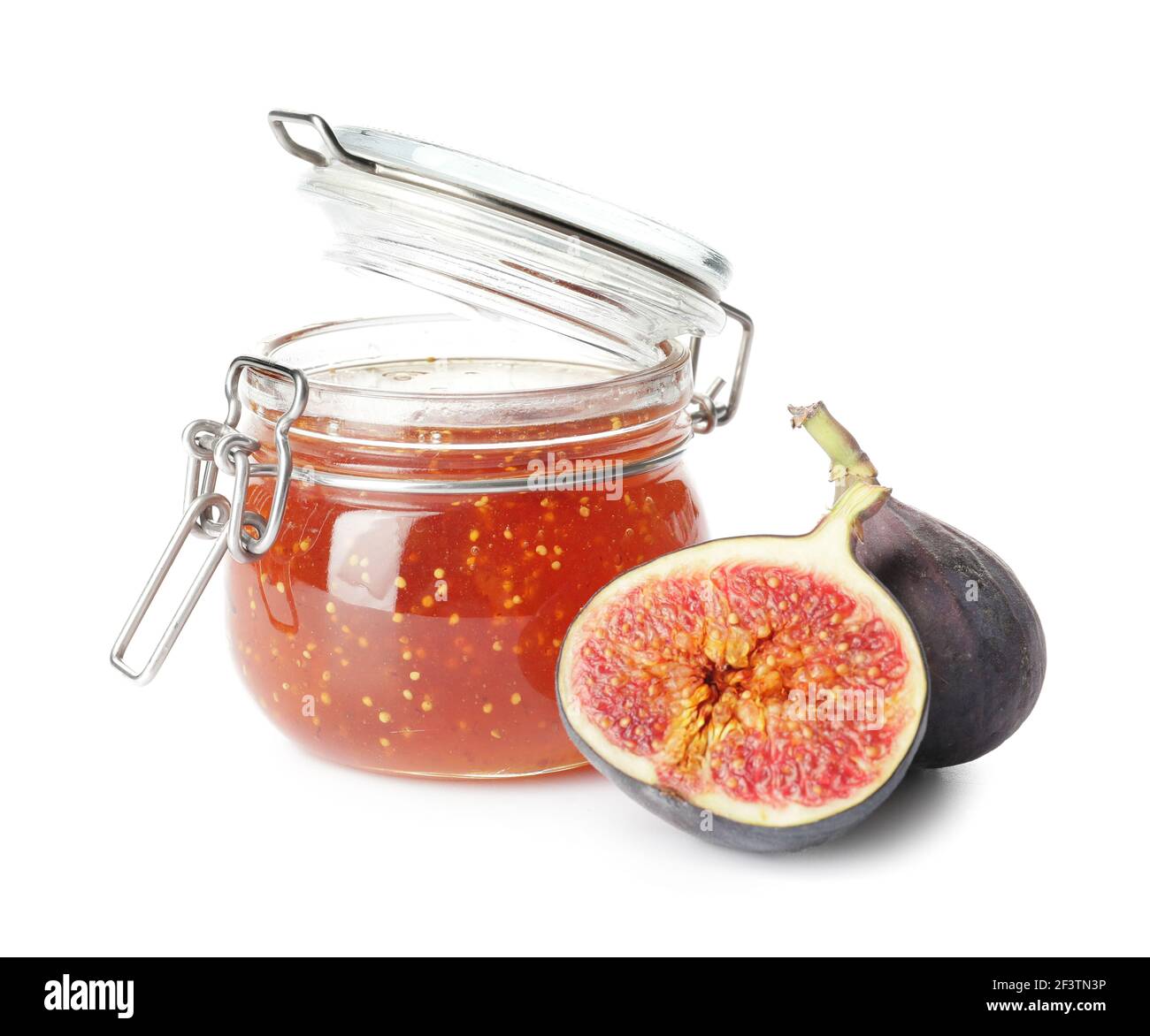 Jar of sweet fig jam on white background Stock Photo - Alamy