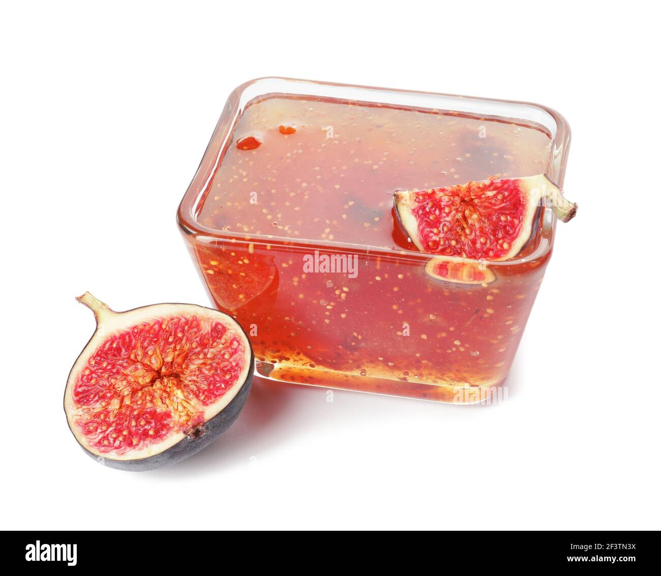 Bowl of sweet fig jam on white background Stock Photo - Alamy