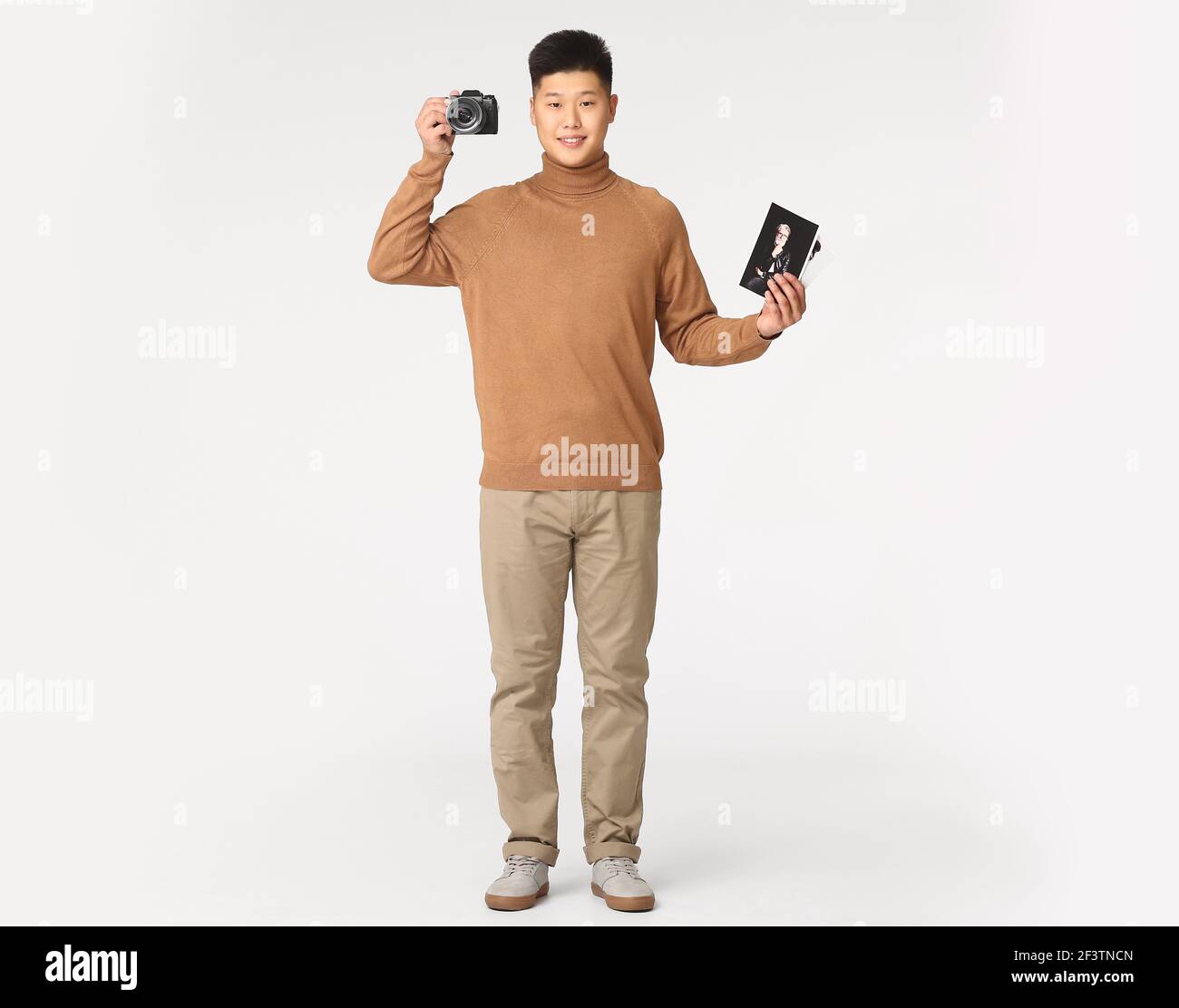 Male Asian photographer on white background Stock Photo - Alamy