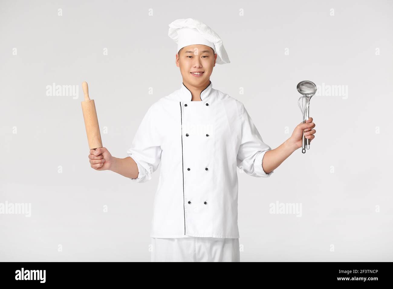 Male Asian chef on white background Stock Photo - Alamy