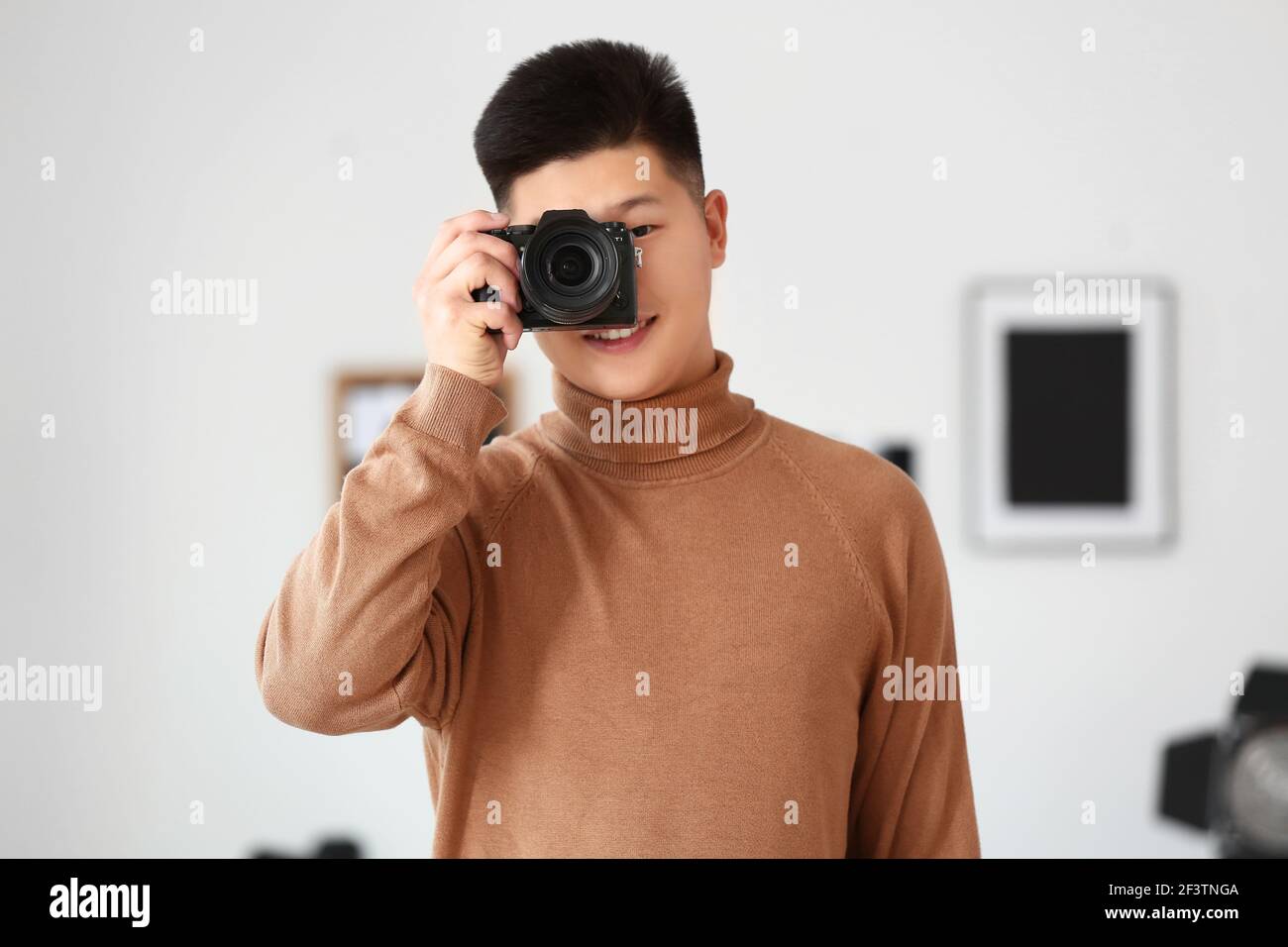 Young asian photographer in hi-res stock photography and images - Alamy