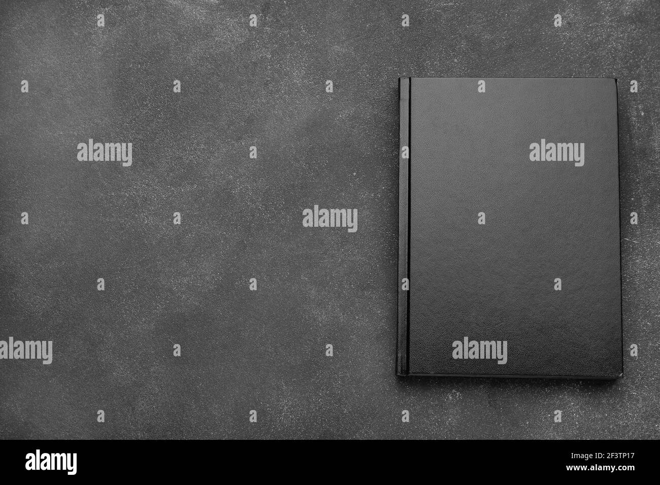 Blank book on dark background Stock Photo - Alamy