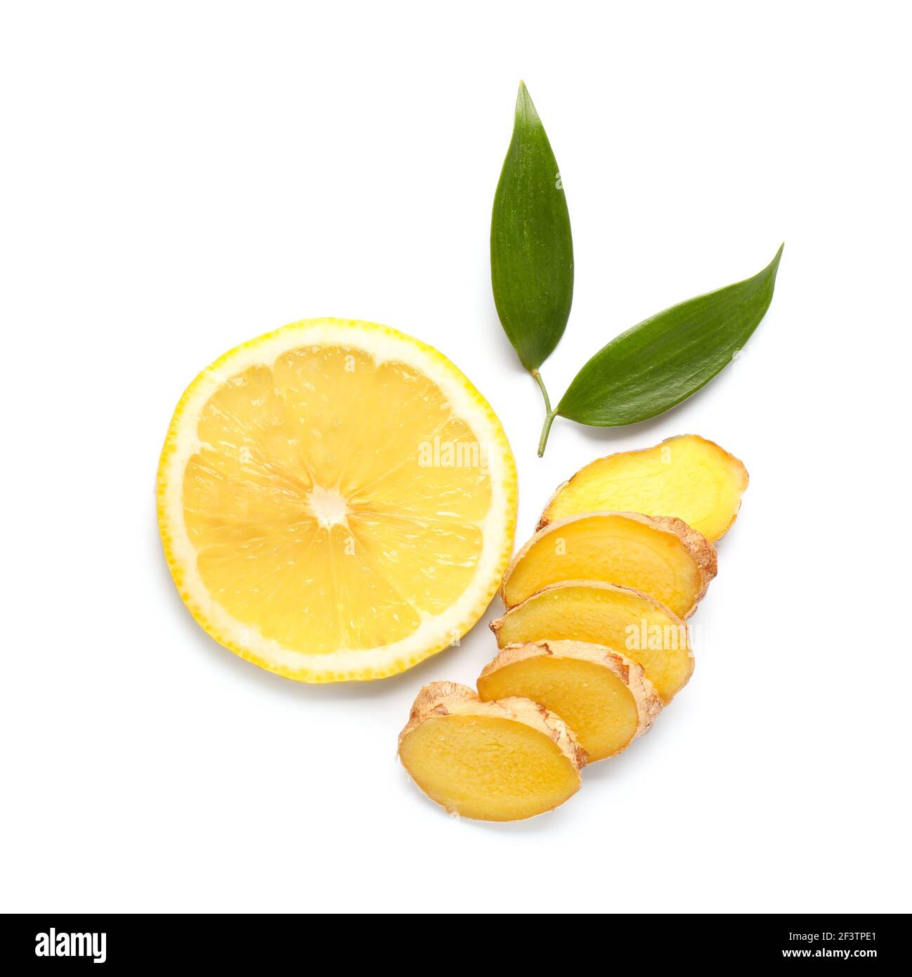 Fresh ginger and lemon on white background Stock Photo - Alamy