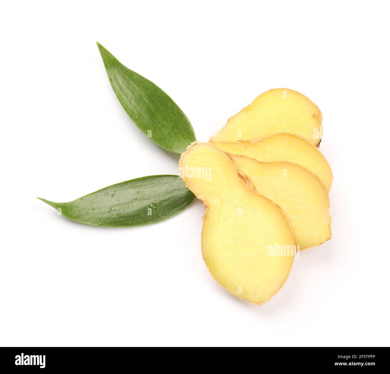 Fresh cut ginger on white background Stock Photo - Alamy