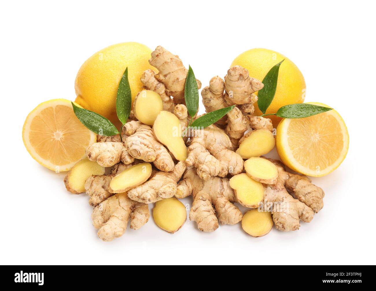 Fresh ginger and lemon on white background Stock Photo - Alamy